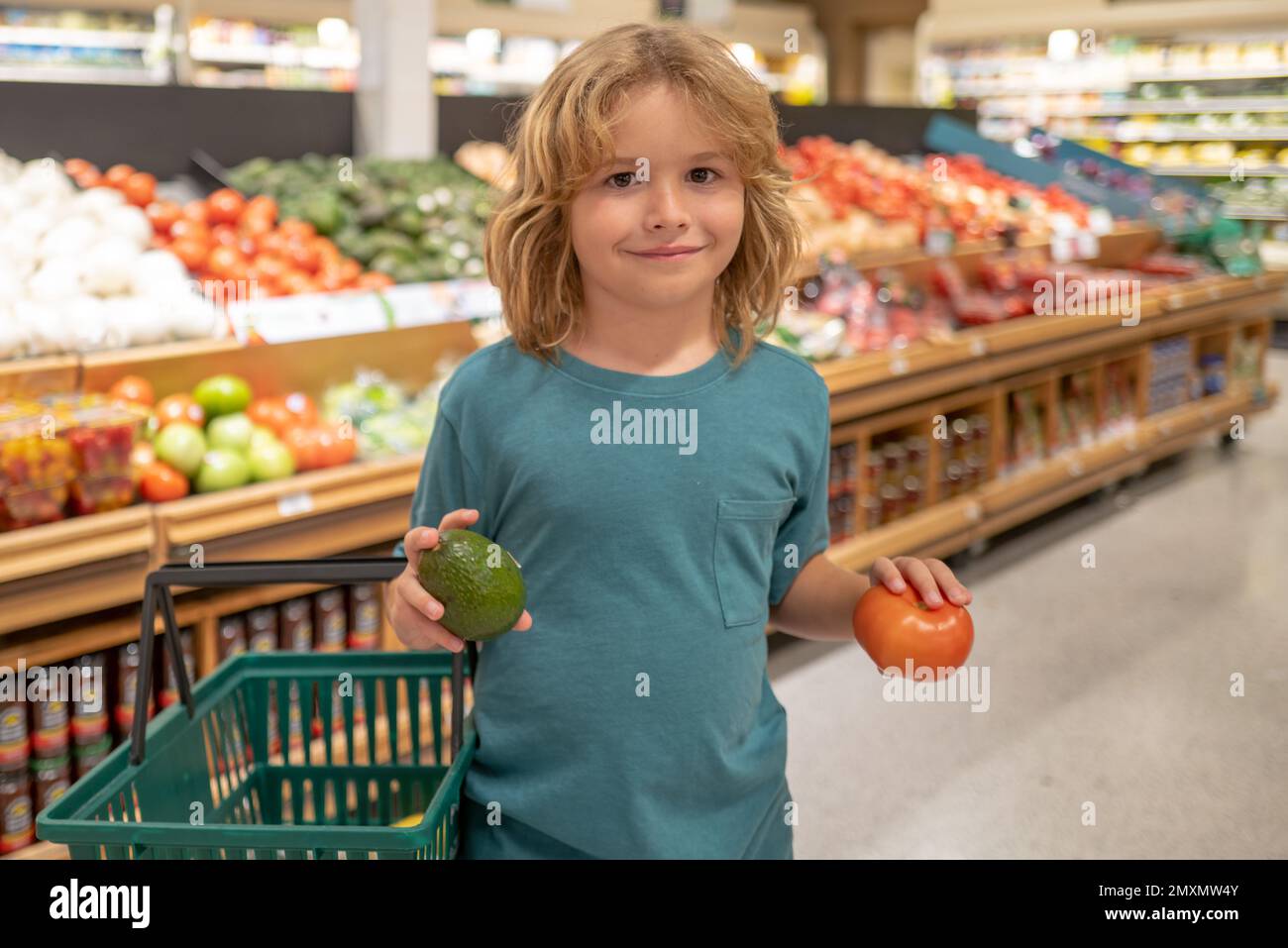 Little child choosing food in grocery store or a supermarket Stock ...