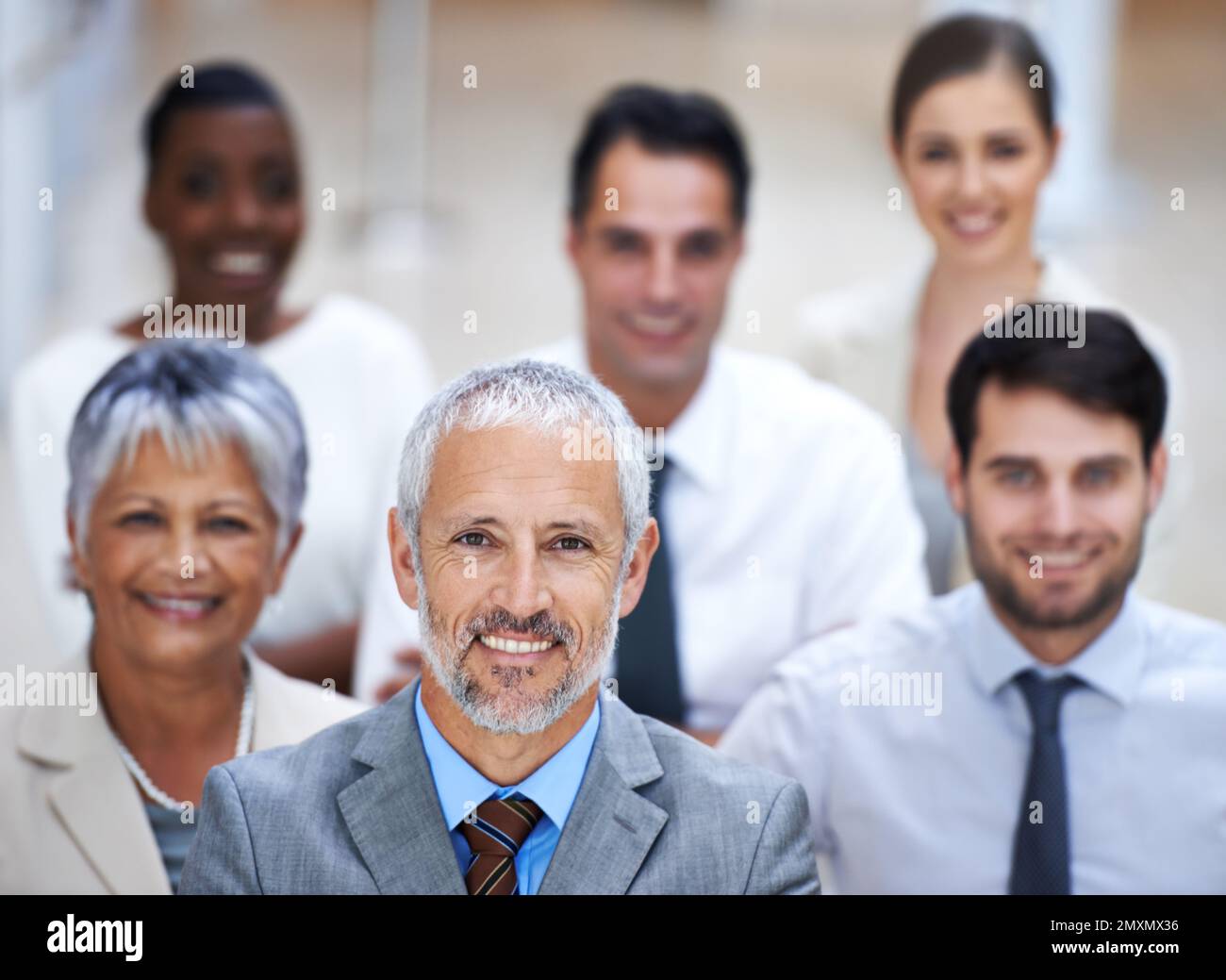The team that never disappoints. Portrait of a smiling businessman ...