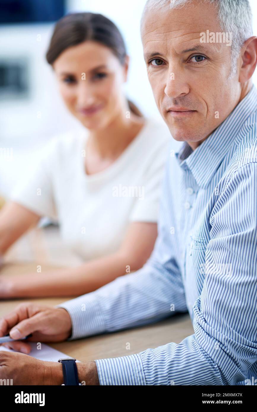 Stern looking woman sitting in hi-res stock photography and images - Alamy