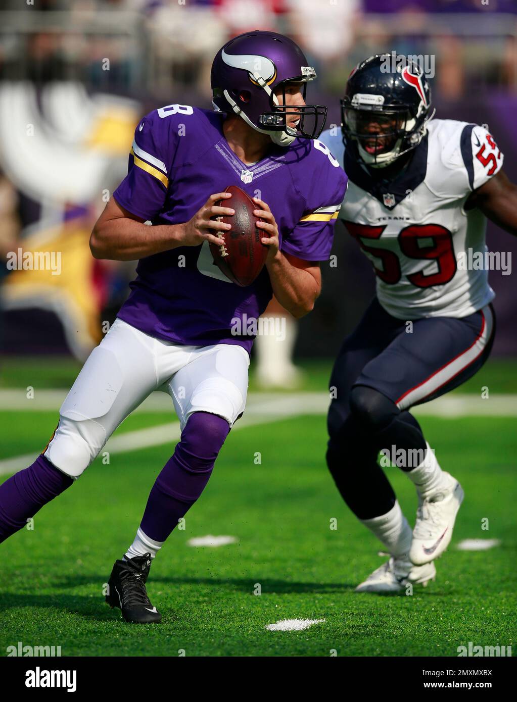 Minnesota Vikings quarterback Sam Bradford (8) looks to pass against ...