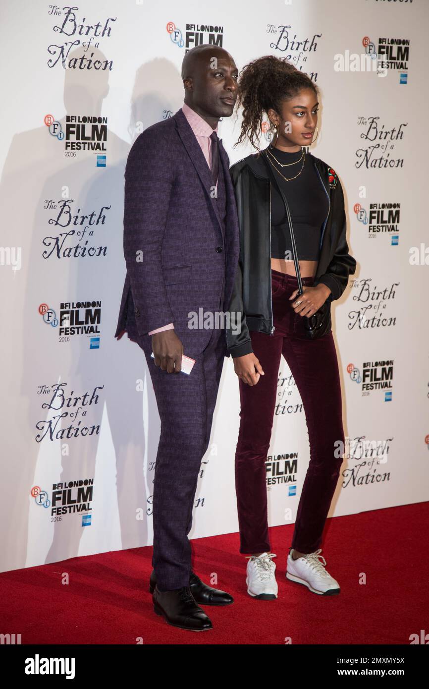 Actor Ozwald Boateng and daughter Emilia Boateng pose for photographers ...