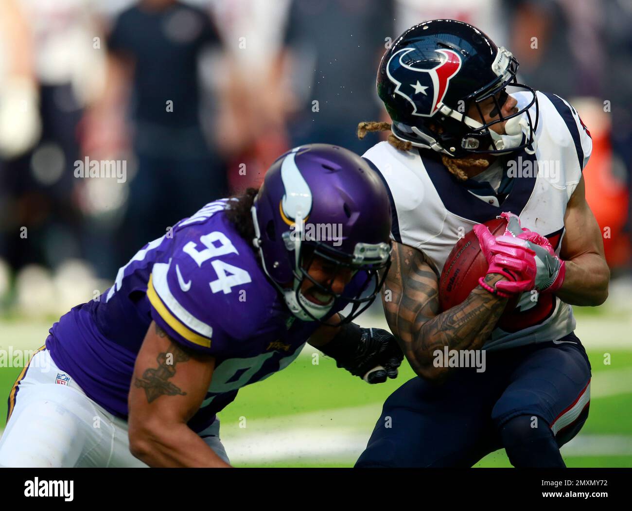 Houston Texans wide receiver Will Fuller (15) is tackled by Minnesota ...