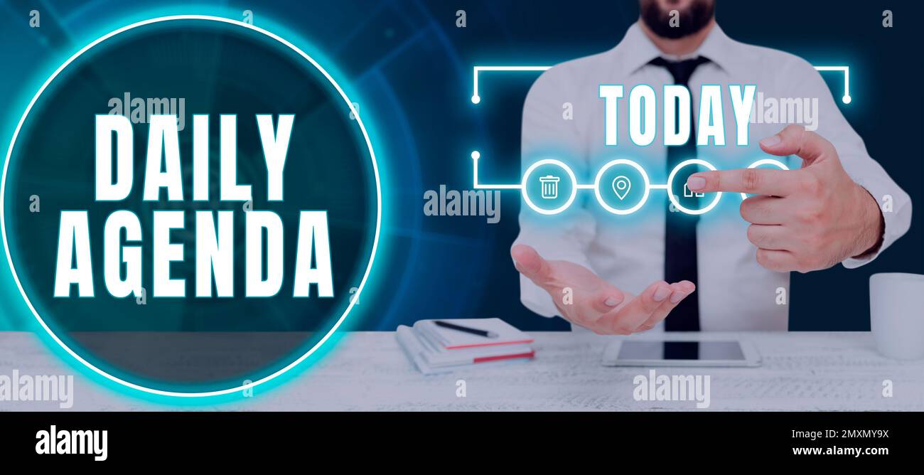 Sign displaying Daily Agenda. Business overview To do list of items be ...