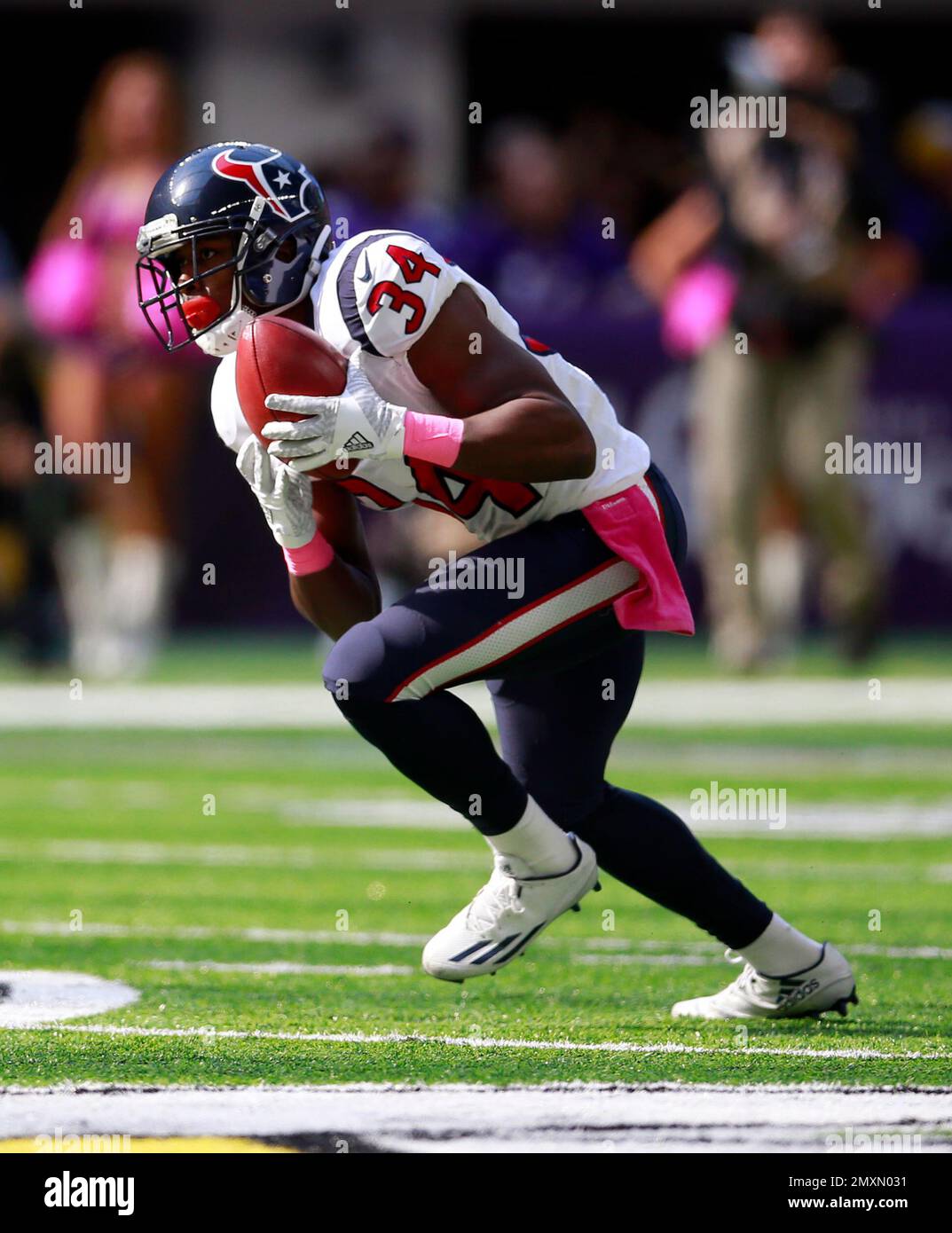 Houston Texans running back Tyler Ervin (34) returns a punt against ...