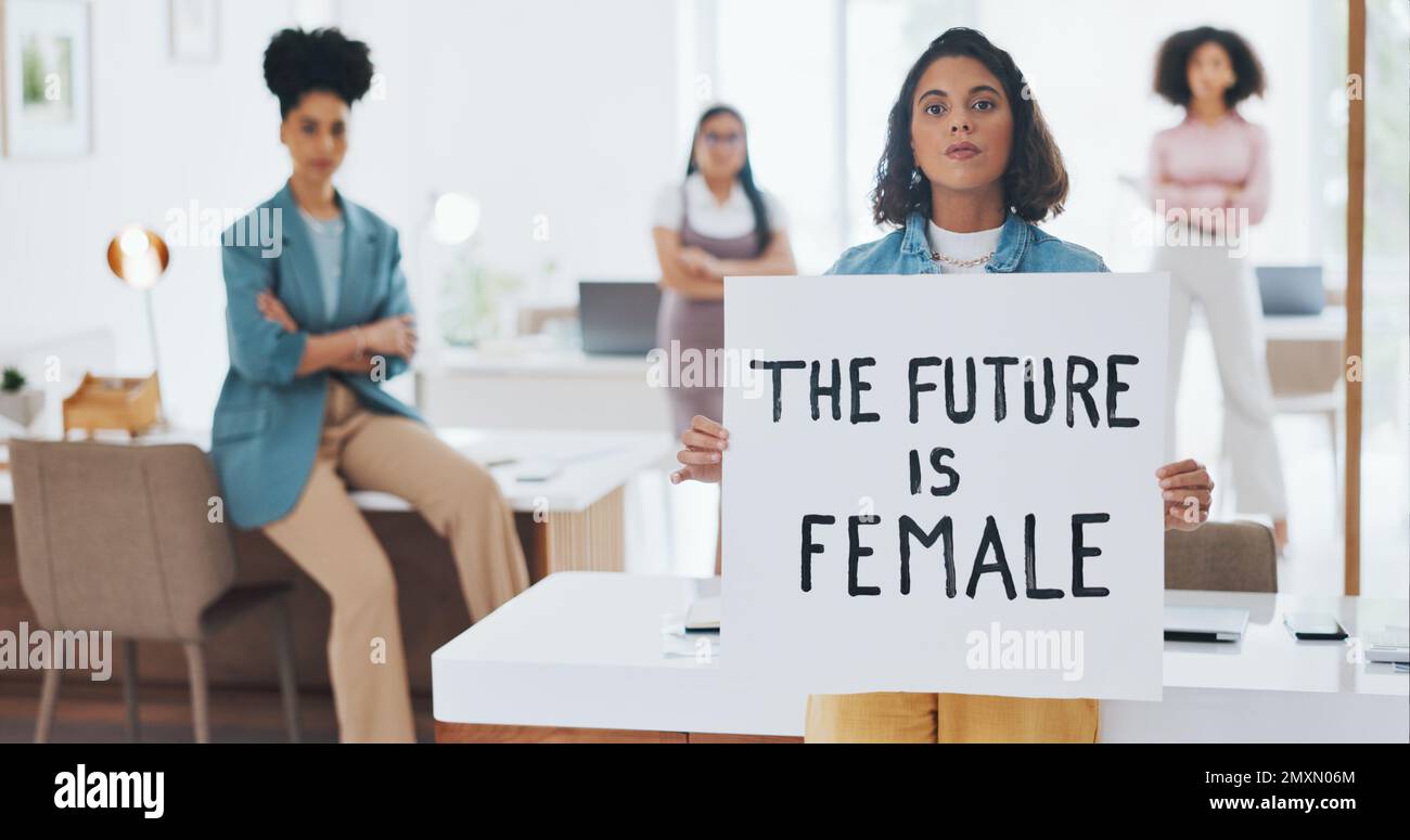 Equality, empowerment and female leader holding a sign in the office ...