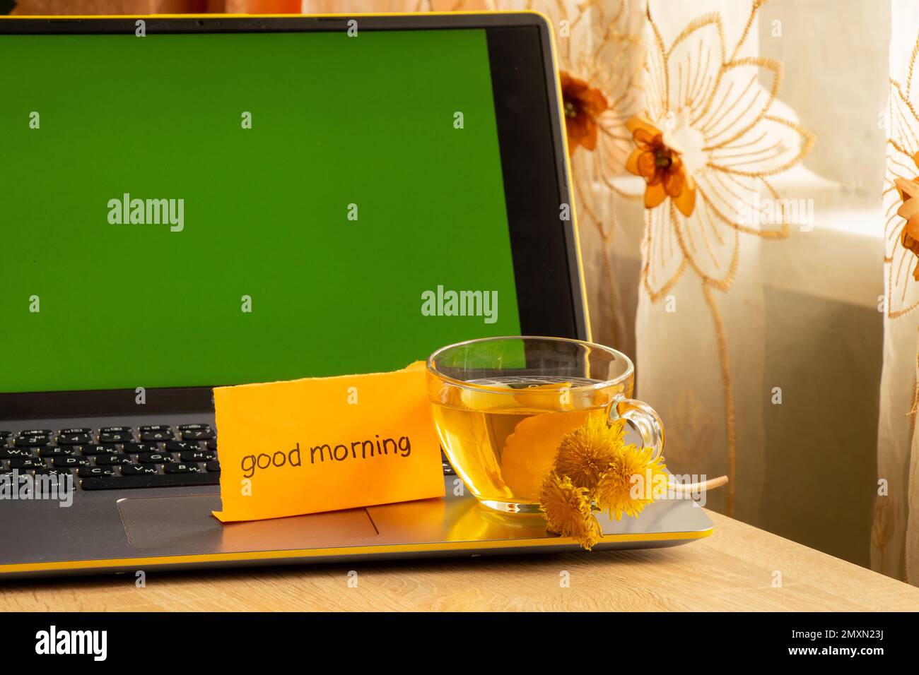 English word laptop good morning and cup of tea at home Stock Photo - Alamy