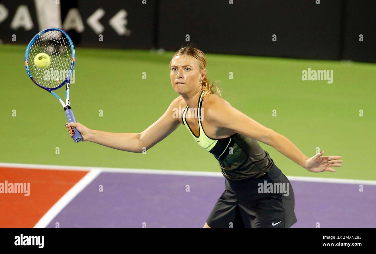Maria Sharapova hits during a World Team Tennis exhibition to benefit ...