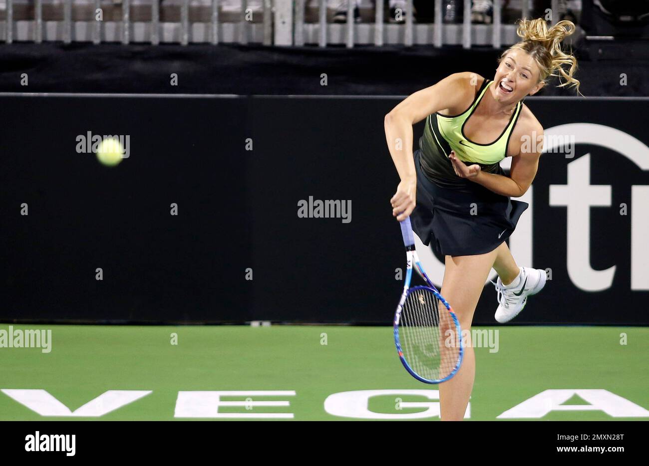Maria Sharapova hits during a World Team Tennis exhibition to benefit ...