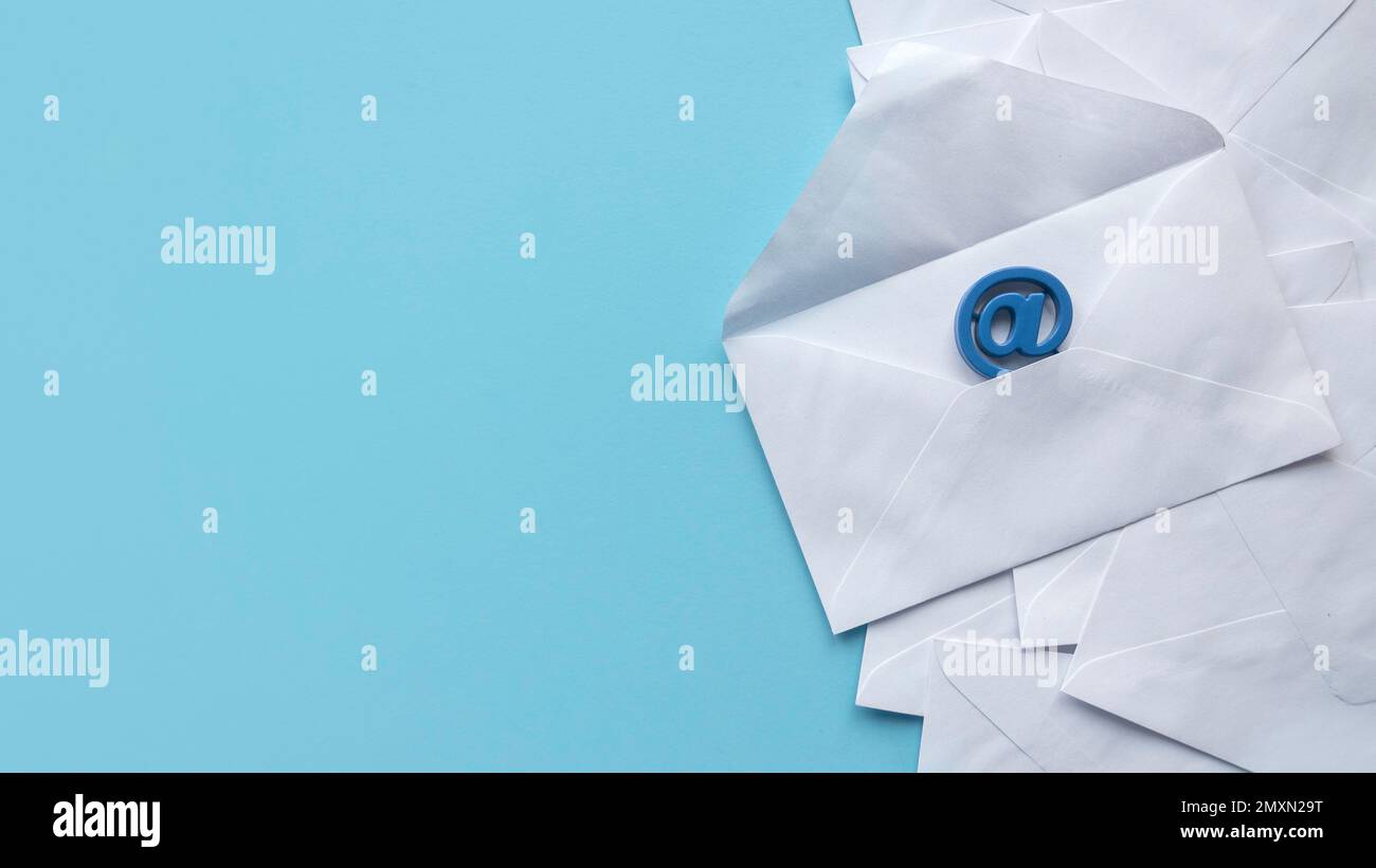 Email marketing concept. An open white envelope and email address ...