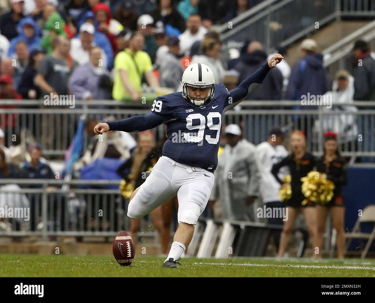 Penn State kicker Joey Julius (99) kicks off against Maryland during ...