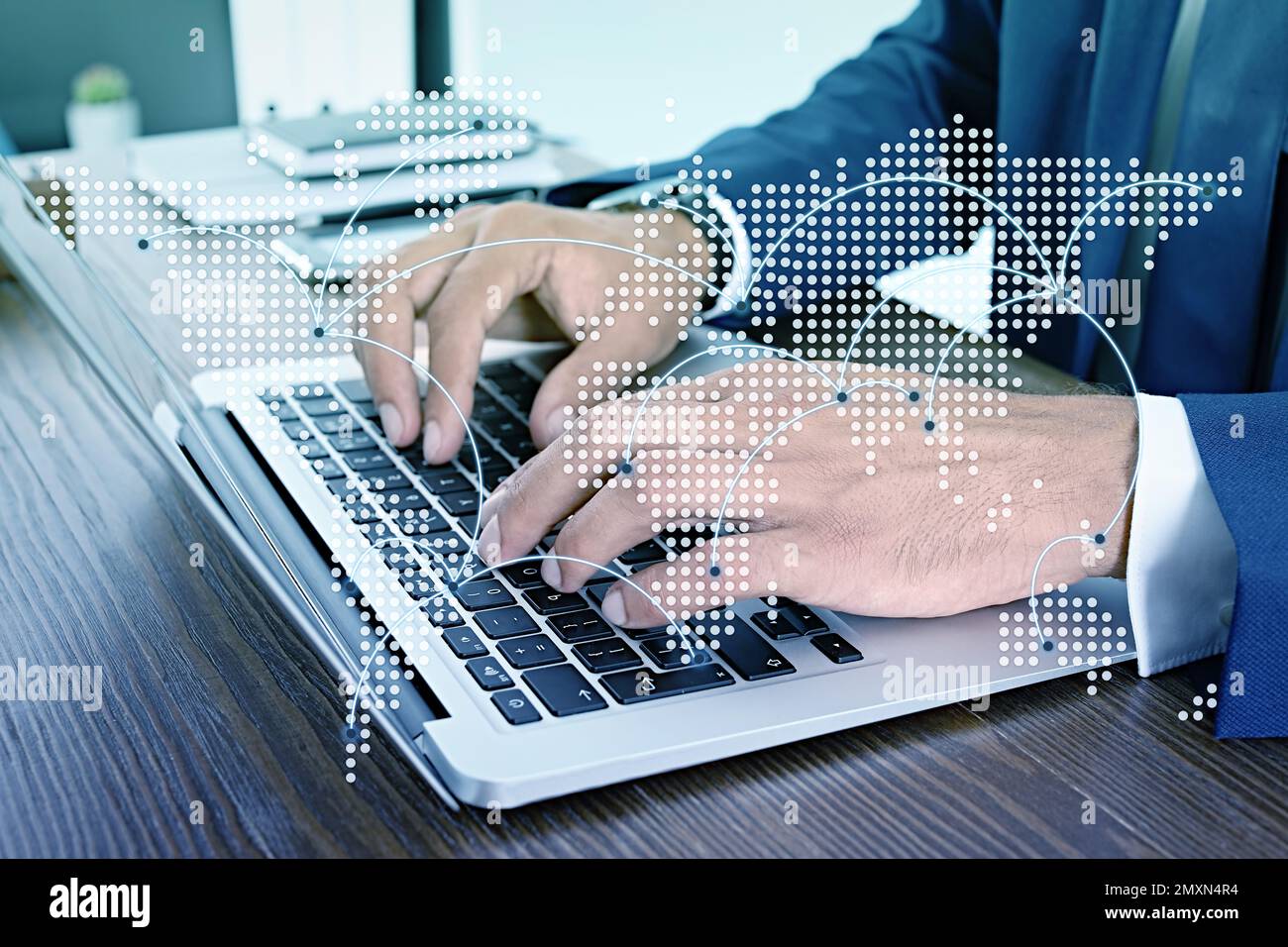 Wholesale and logistics concept. Man using laptop in office, world map ...