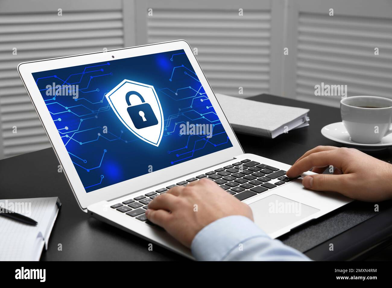 Cyber security concept. Man using application on laptop, closeup Stock ...