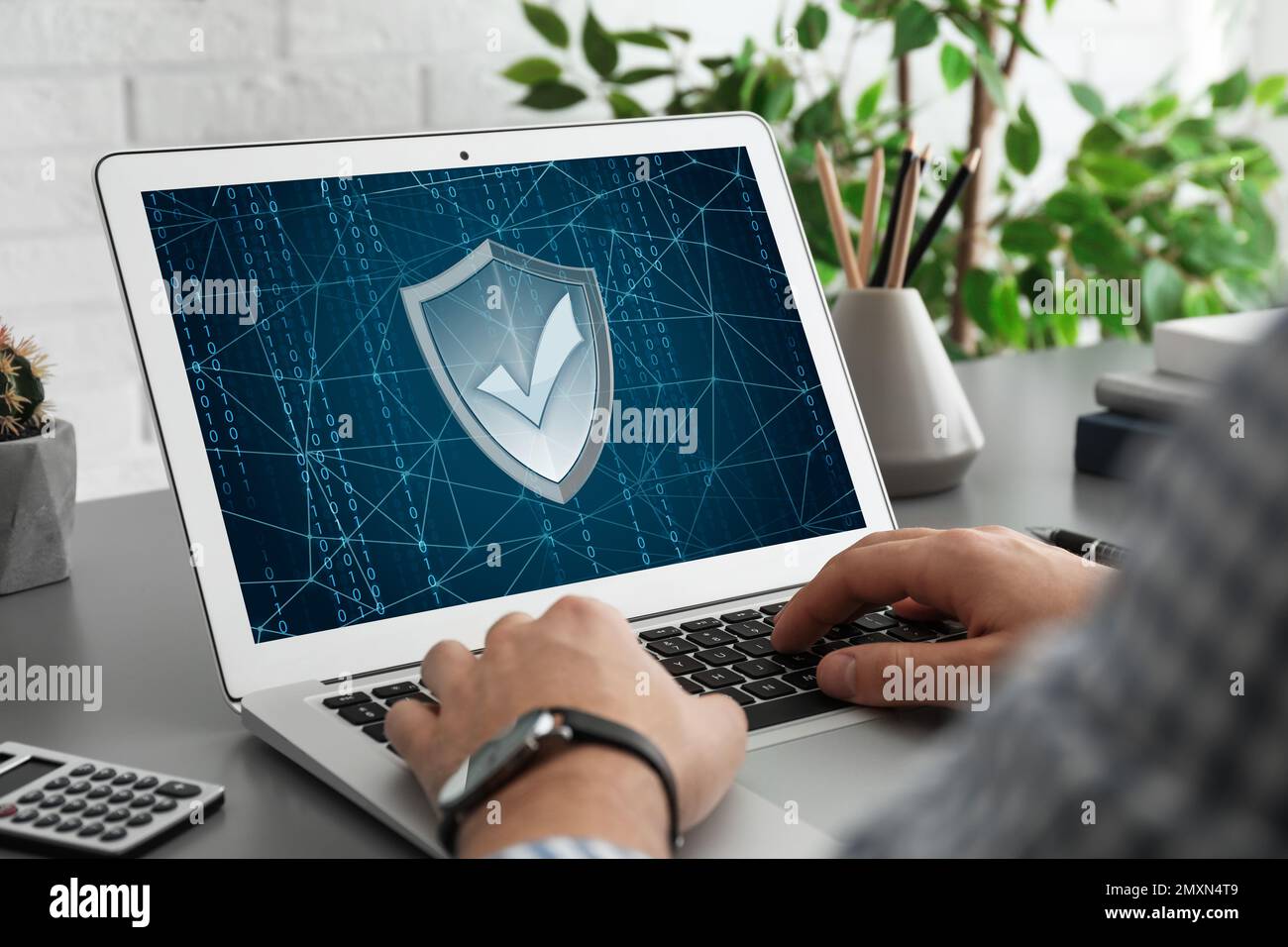 Cyber security concept. Man using application on laptop, closeup Stock ...