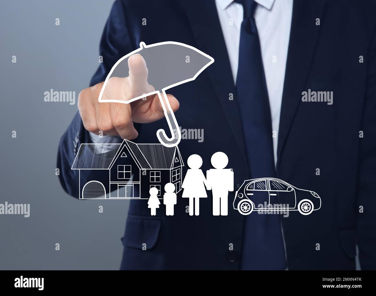 Insurance concept - umbrella demonstrating protection. Man using ...