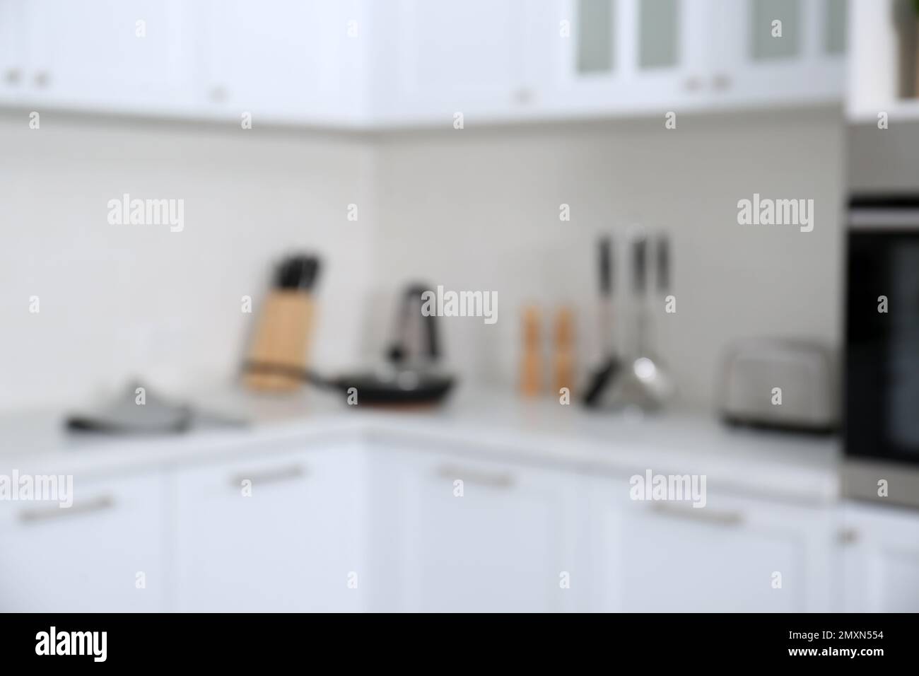 Blurred view of modern stylish kitchen interior Stock Photo - Alamy