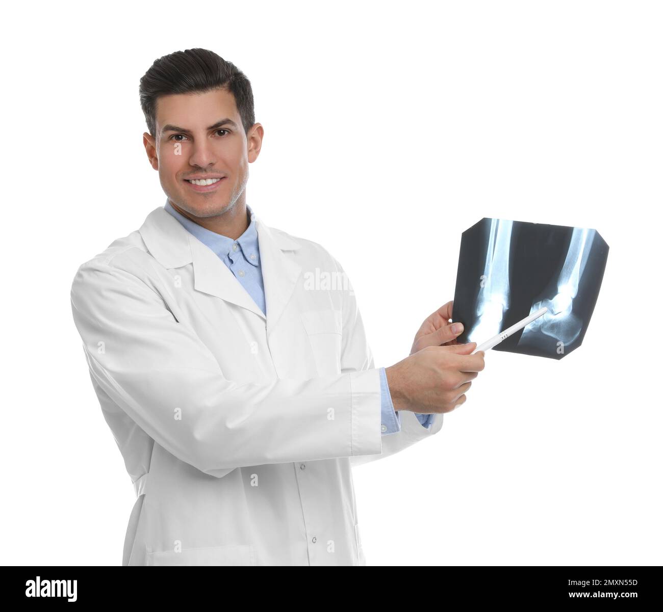 Orthopedist holding X-ray picture on white background Stock Photo - Alamy