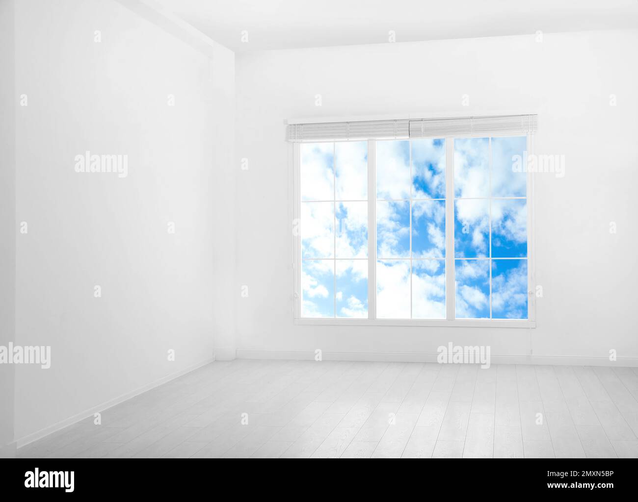 Beautiful view on blue sky with clouds through window in room Stock ...