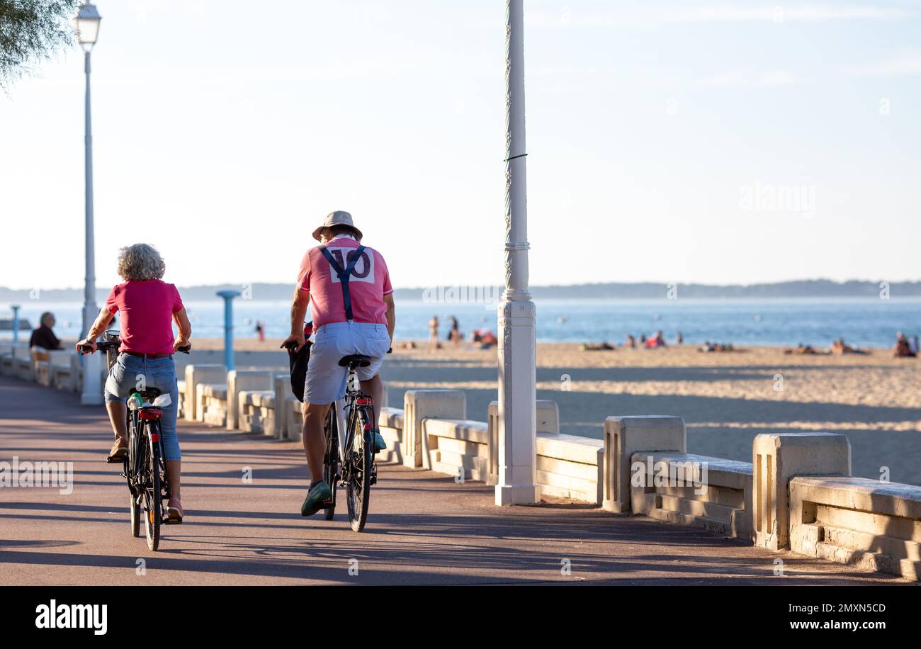 Person riding a bicycle on a cycle path Stock Photo - Alamy