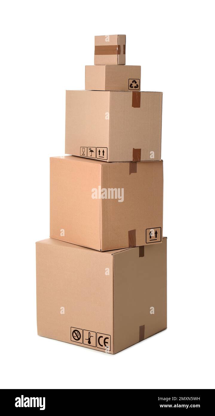 Stack of parcels with different packaging symbols on white background ...