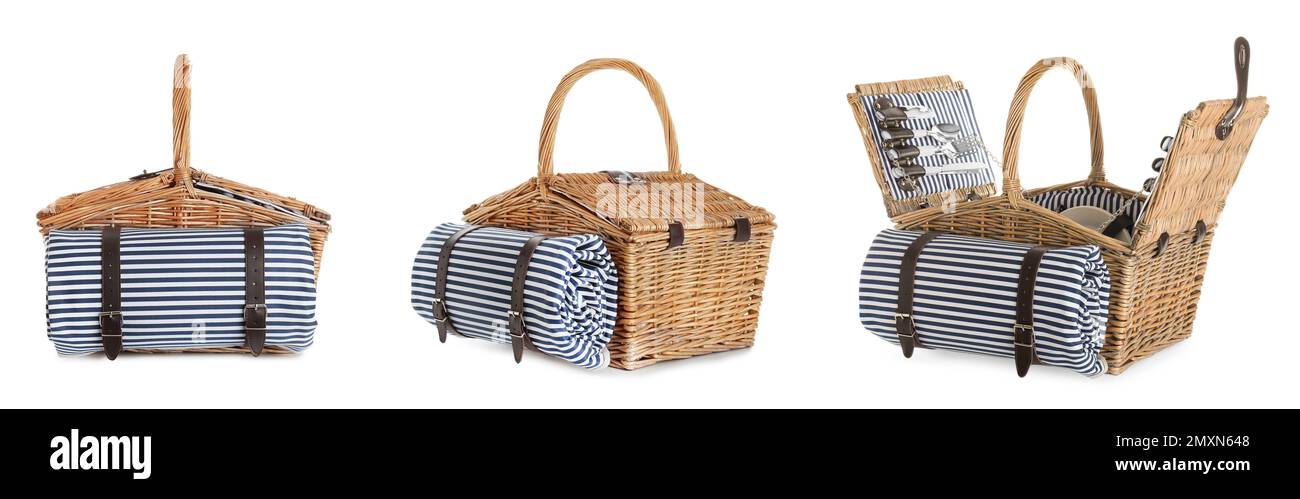 Set of wicker baskets with picnic essentials and blanket on white ...