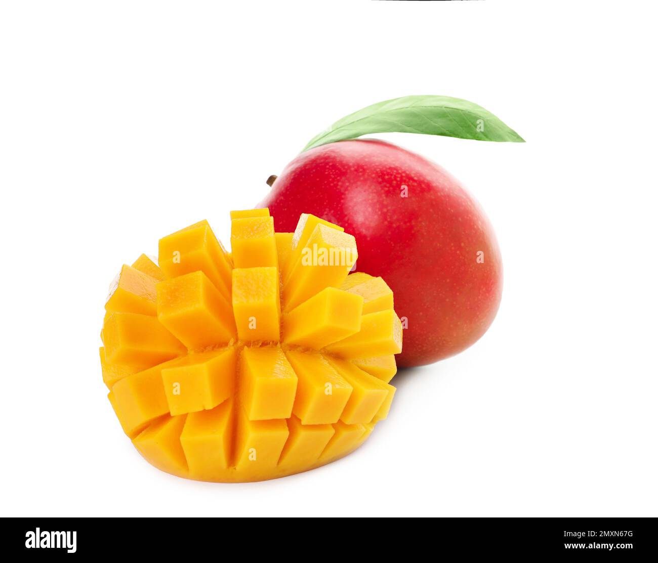 Whole and cut ripe mangoes isolated on white. Exotic fruit Stock Photo ...