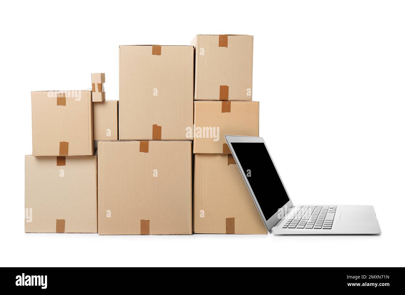 Online selling. Laptop and parcels on white background Stock Photo - Alamy