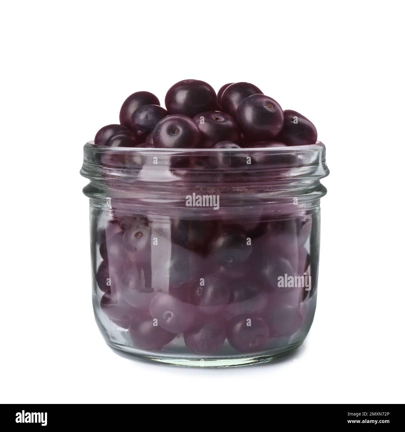 Fresh acai berries in glass jar isolated on white Stock Photo - Alamy