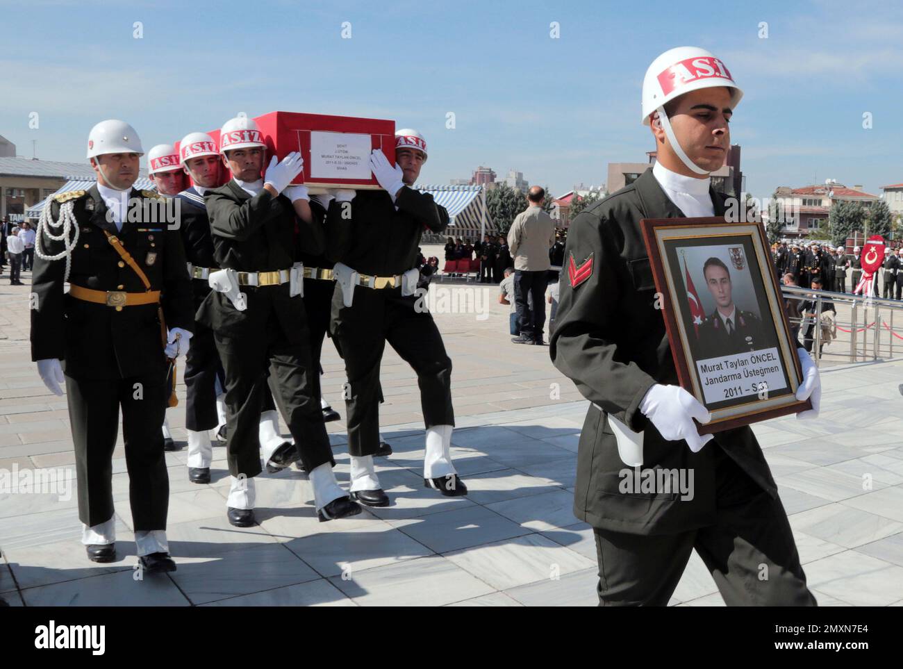 Soldiers carry the coffin of army officer Lt. Murat Taylan Oncel, 33 ...