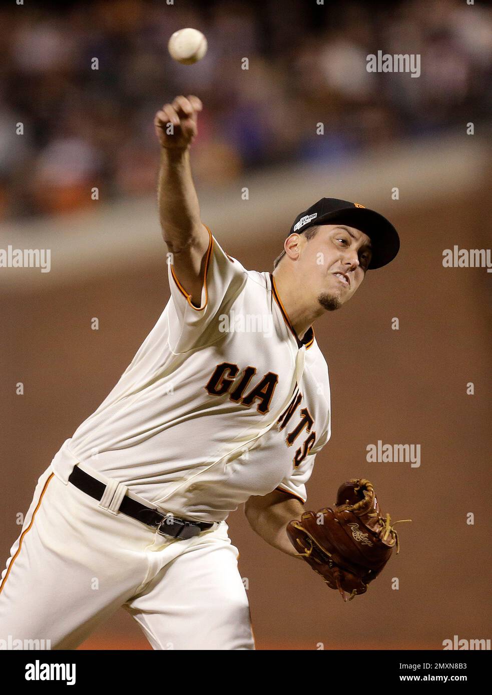 San Francisco Giants pitcher Derek Law throws against the Chicago Cubs ...