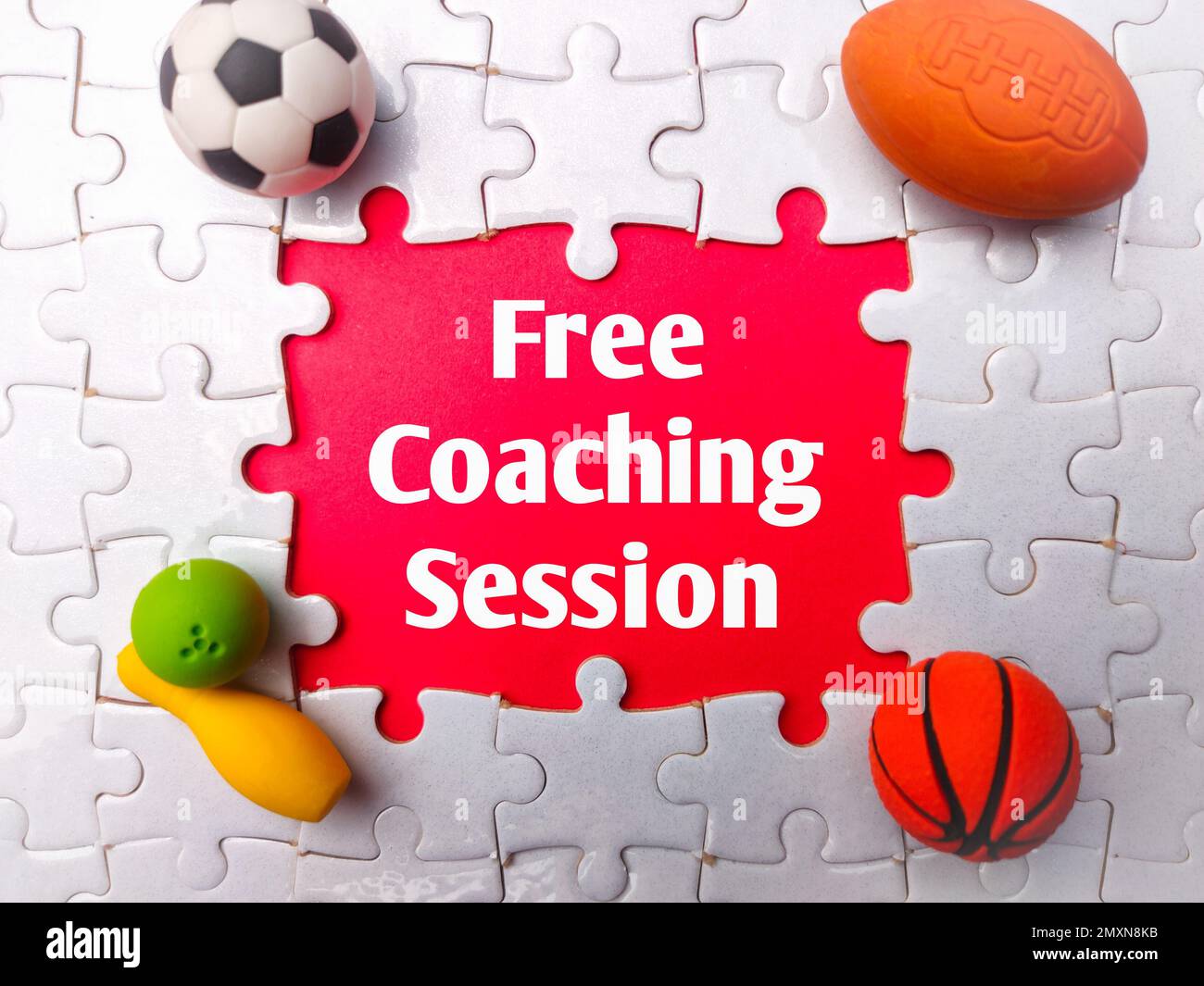 White puzzle with the word Free Coaching Session on a red background ...