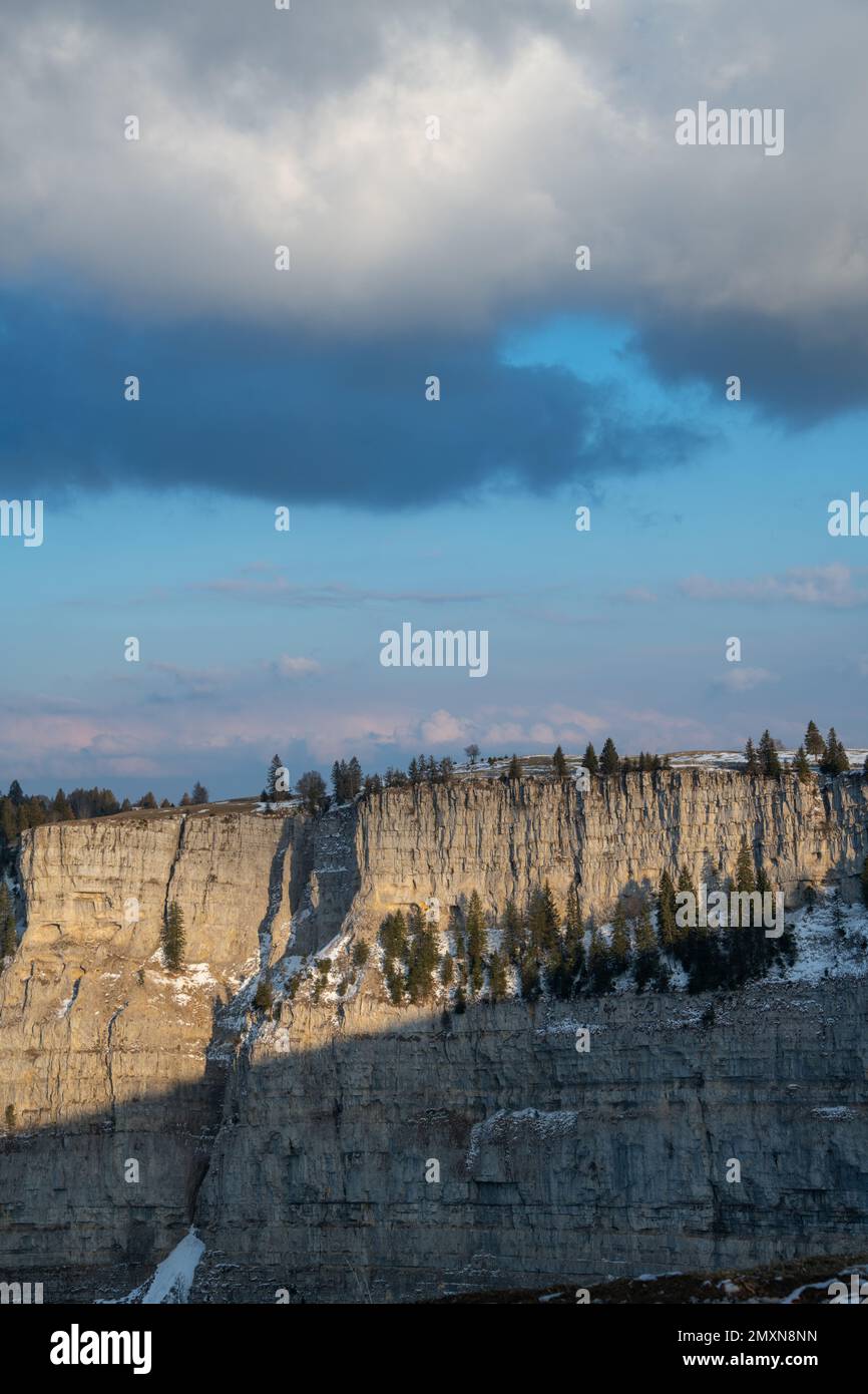A high cliff in winter during the sunset Stock Photo - Alamy