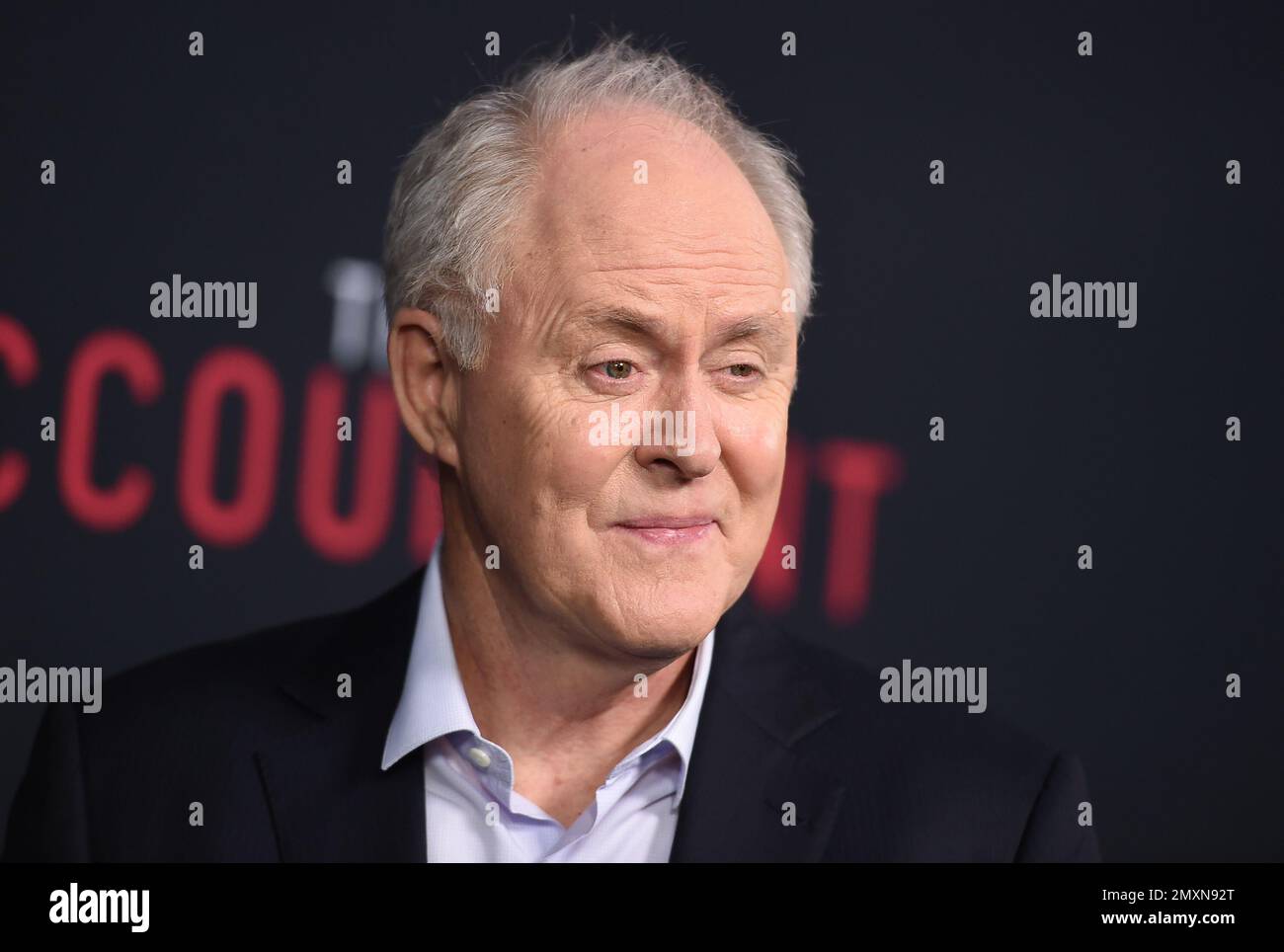 John Lithgow arrives at the world premiere of "The Accountant" at the ...