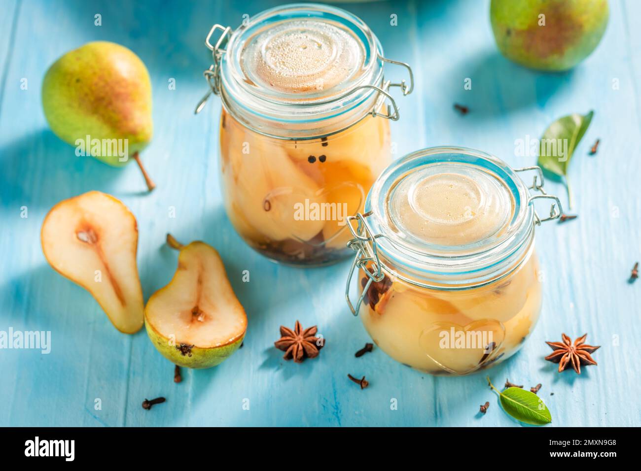 Homemade pickled pears in jar with spices. Seasonal fruits pickled for ...