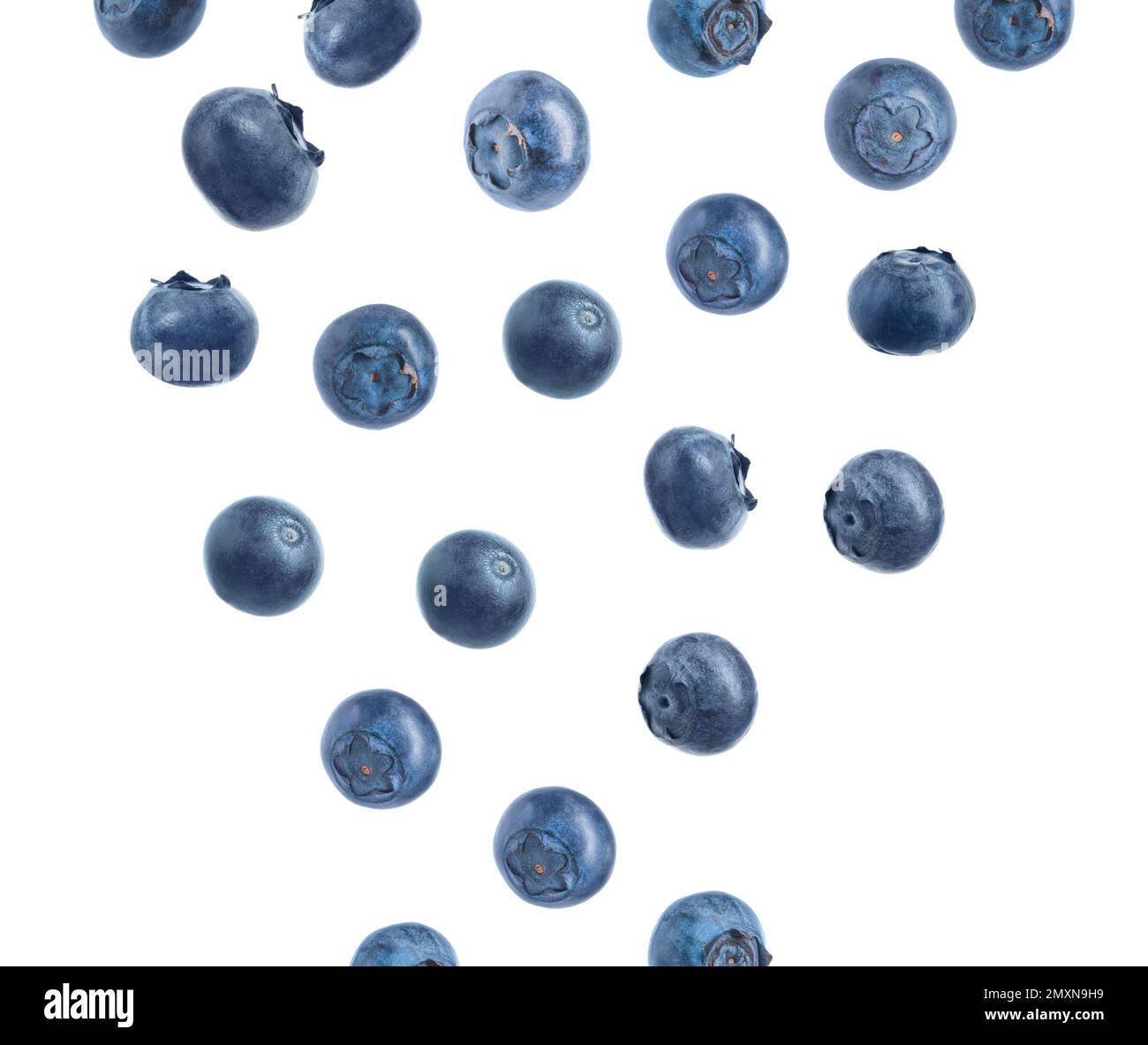 Fresh ripe blueberries falling on white background Stock Photo - Alamy