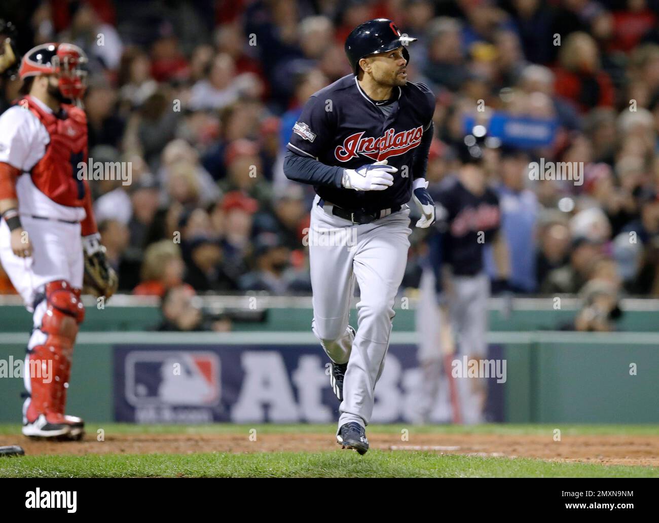 Cleveland Indians' Coco Crisp, right, watches his two-run home run off ...