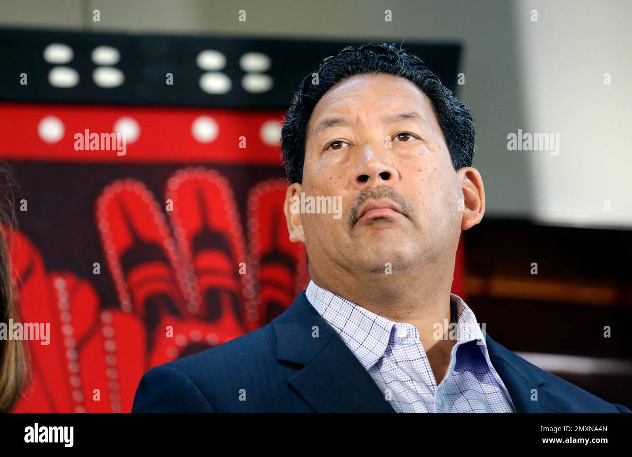 Seattle City Council member Bruce Harrell looks on at a celebration of ...