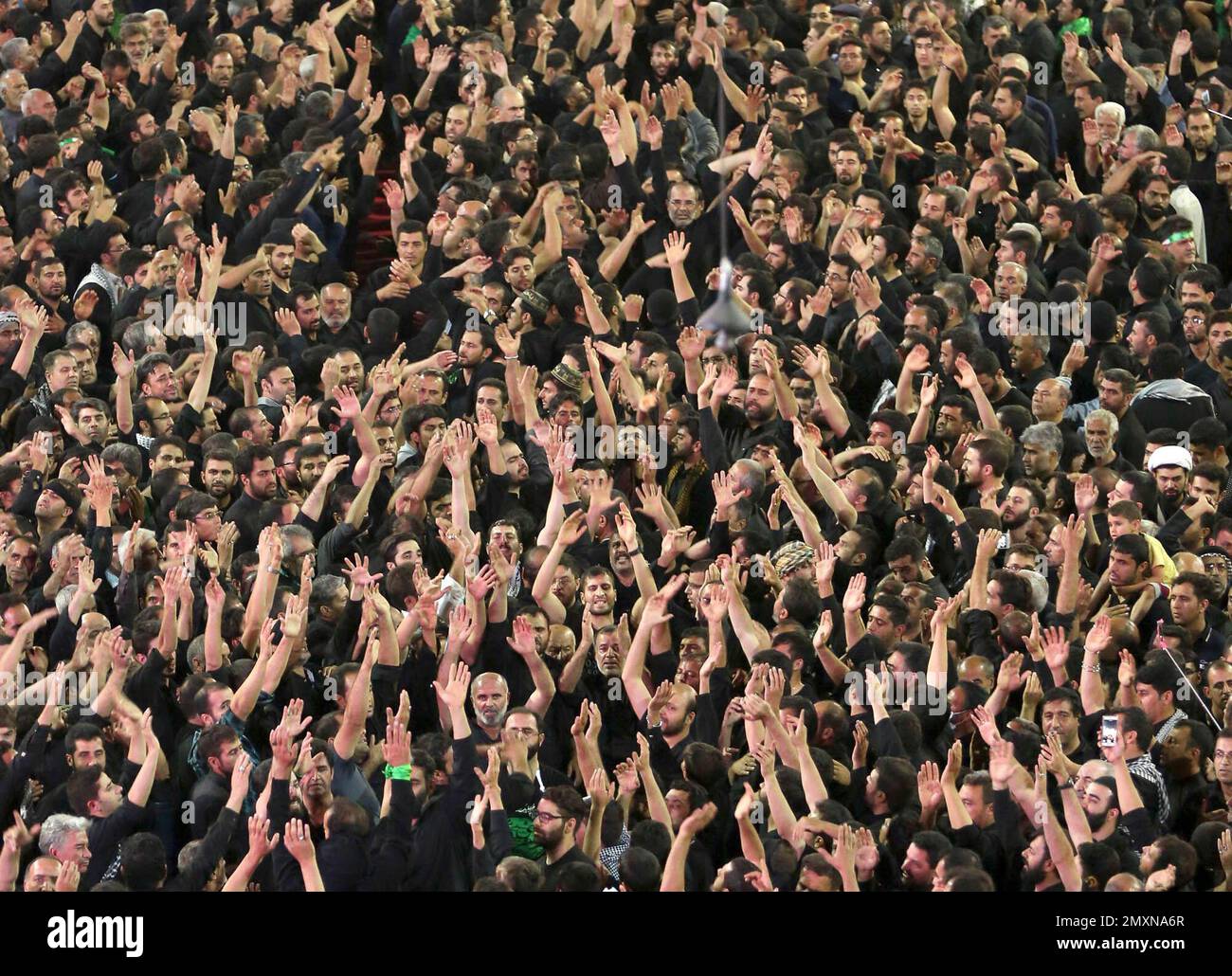Shiite worshippers gather inside the shrine of Imam Hussein during ...