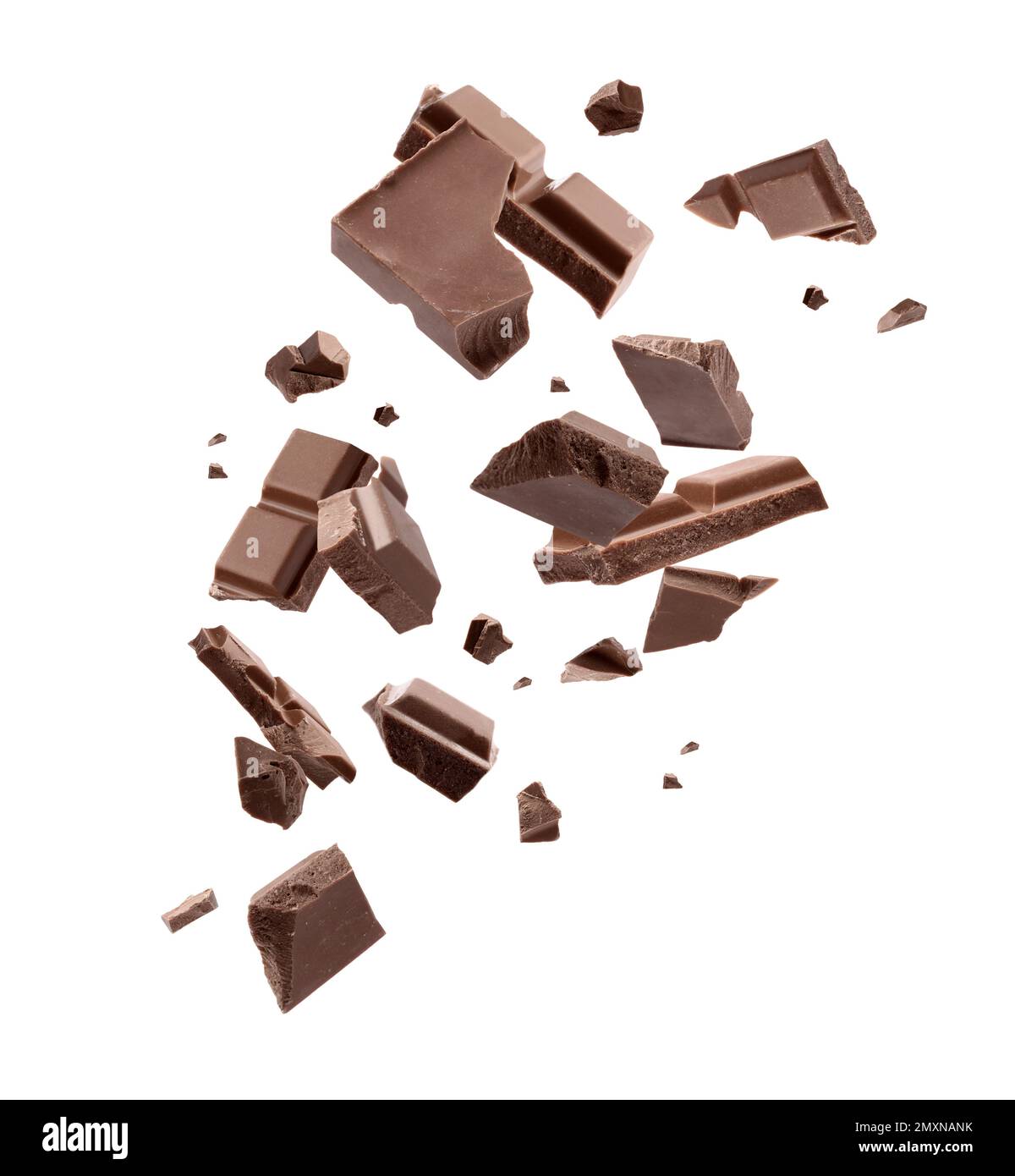 Milk chocolate pieces falling on white background Stock Photo - Alamy