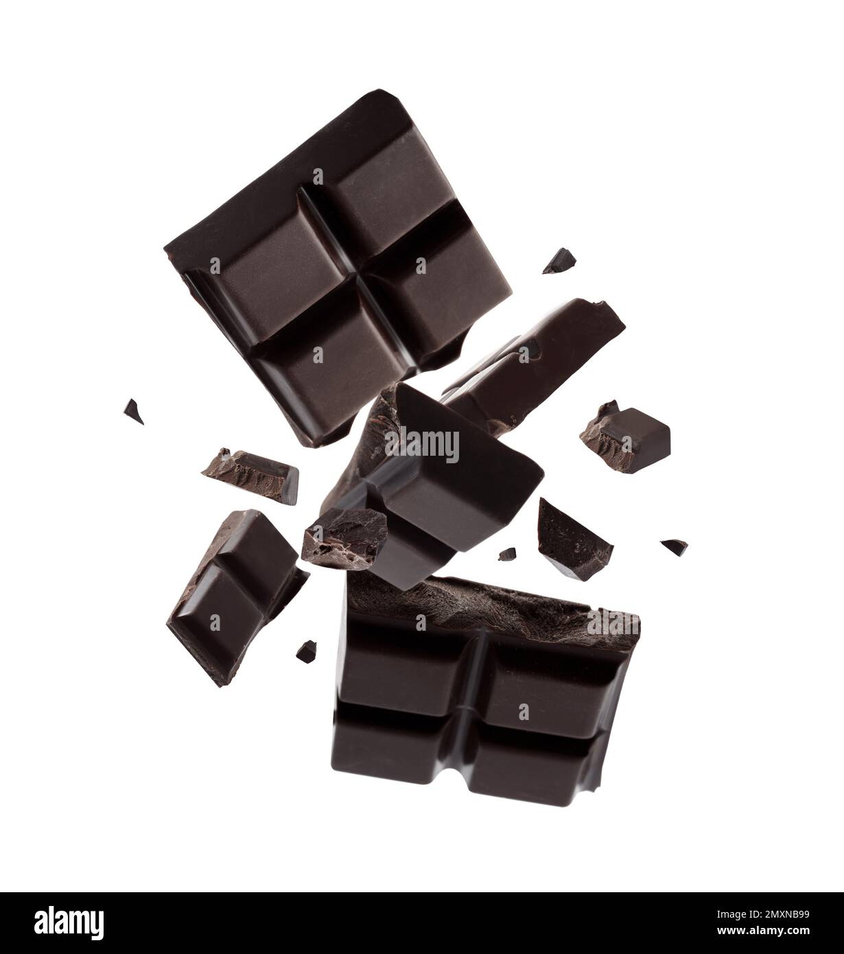 Pieces of dark chocolate falling on white background Stock Photo - Alamy