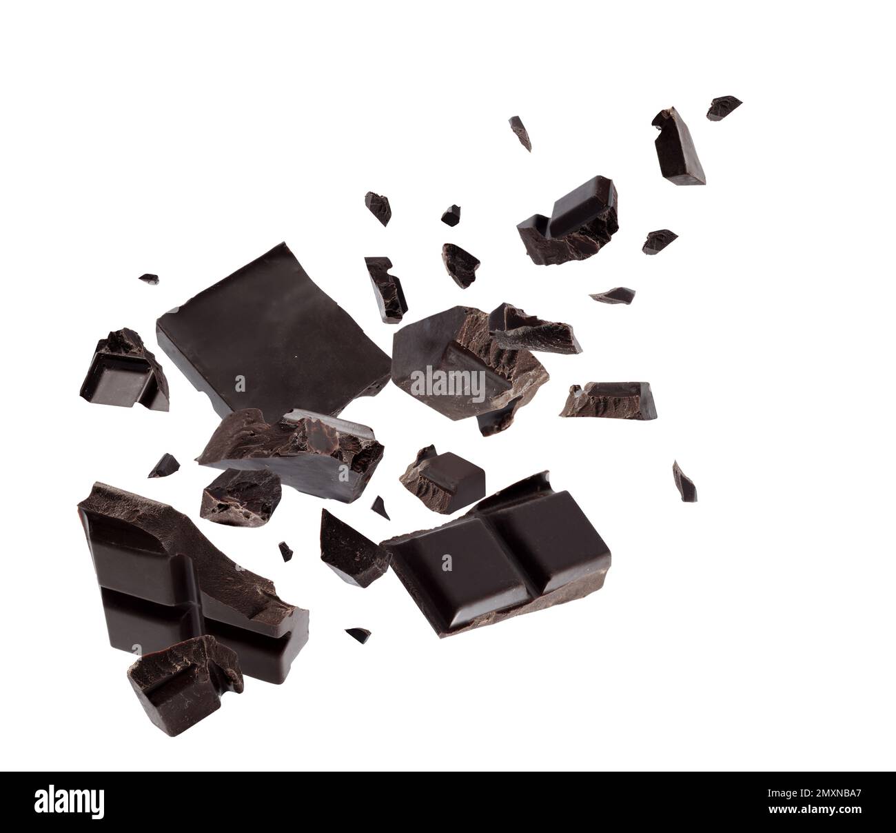 Pieces of dark chocolate falling on white background Stock Photo - Alamy