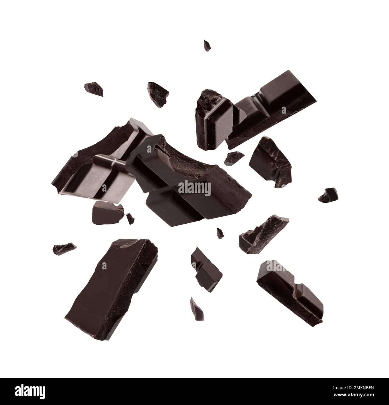 Dark chocolate explosion, pieces shattering on white background Stock ...