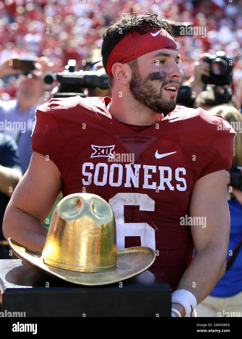Oklahoma quarterback Baker Mayfield (6) stands on the filed after an NCAA college football game ...