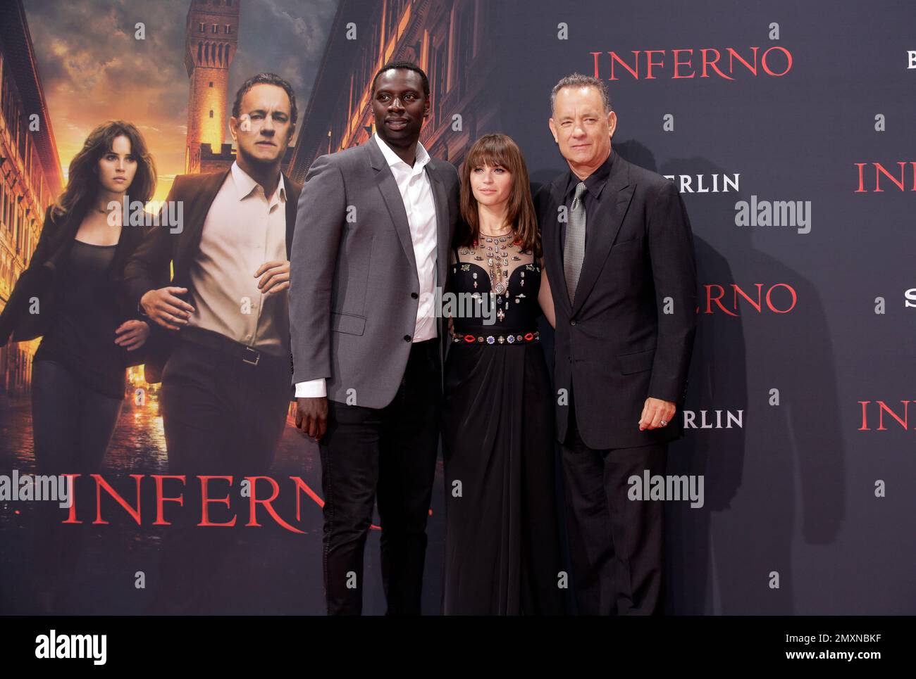 From left, actors Omar Sy, Felicity Jones and Tom Hanks arrive for the ...