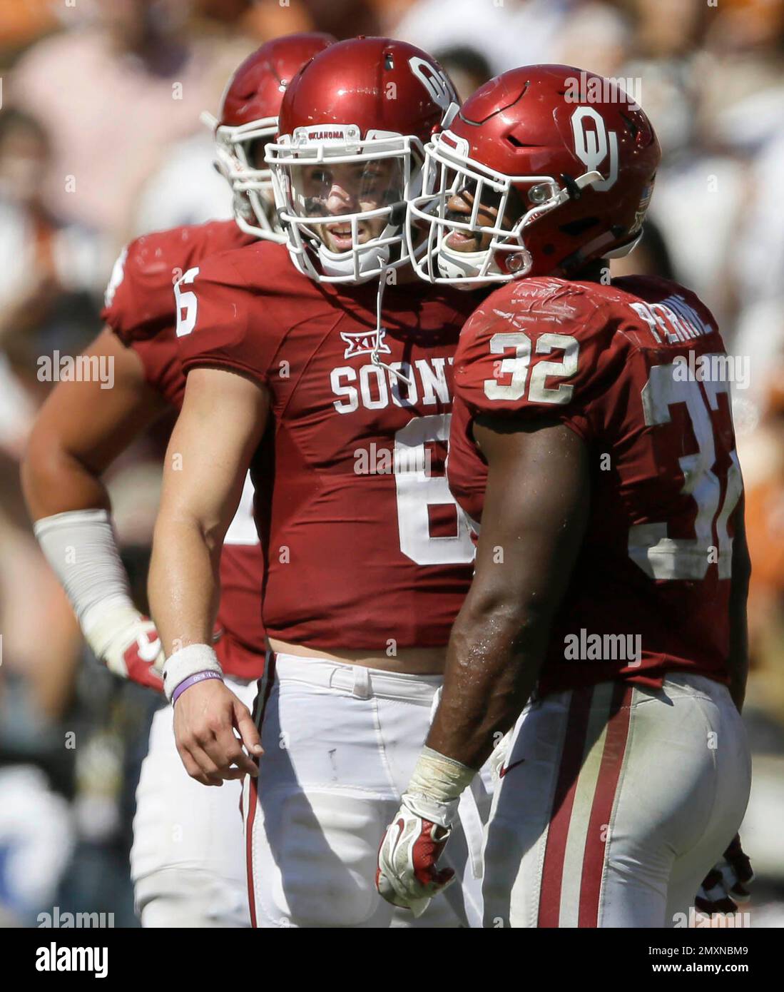 Oklahoma quarterback Baker Mayfield (6) and running back Samaje Perine (32) stand on the field ...
