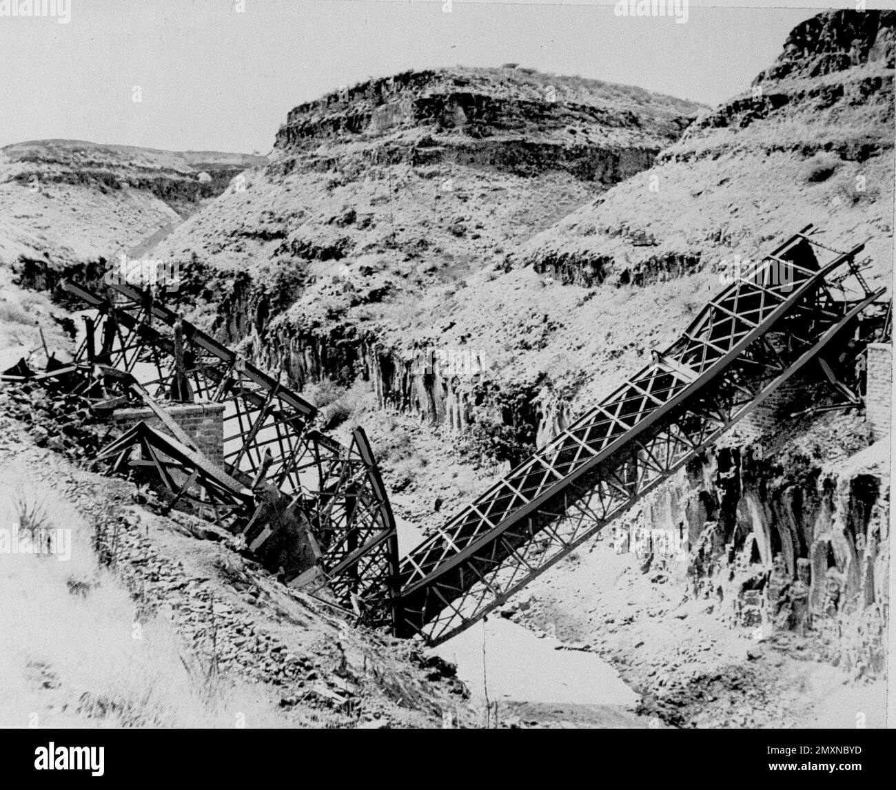 A railroad bridge over the Awash River lies in ruins after Italian ...