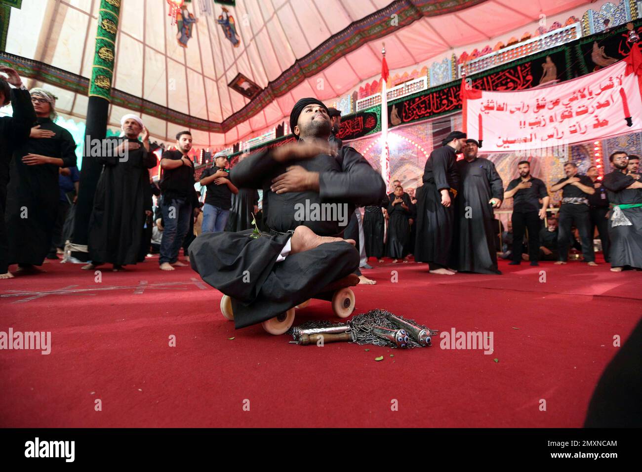 Shiite worshippers gather during Muharram, an important period of ...