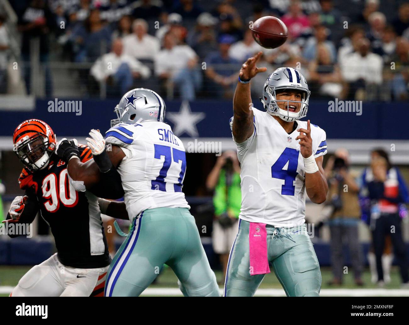 Dallas Cowboys quarterback Dak Prescott (4) throws a pass as tackle ...