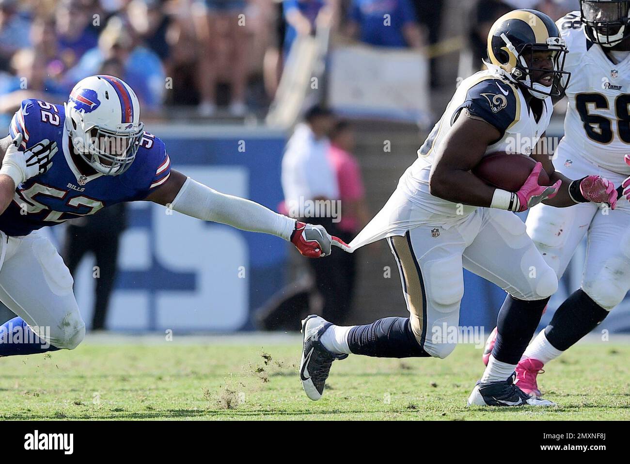 Buffalo Bills inside linebacker Preston Brown, left, gets a finger on ...