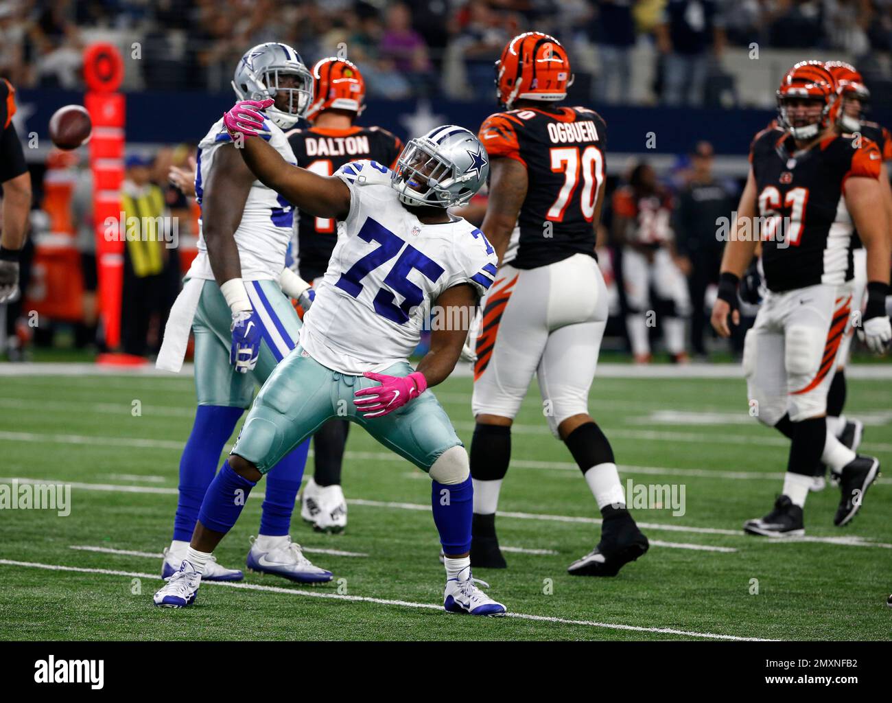 Dallas Cowboys linebacker Ryan Davis (75) celebrates sacking Cincinnati ...