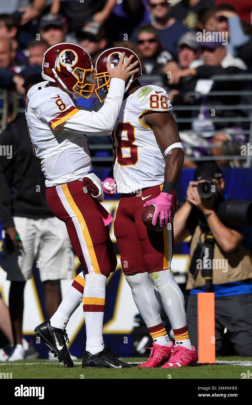 Washington Redskins' Kirk Cousins, left, and Pierre Garcon celebrate ...